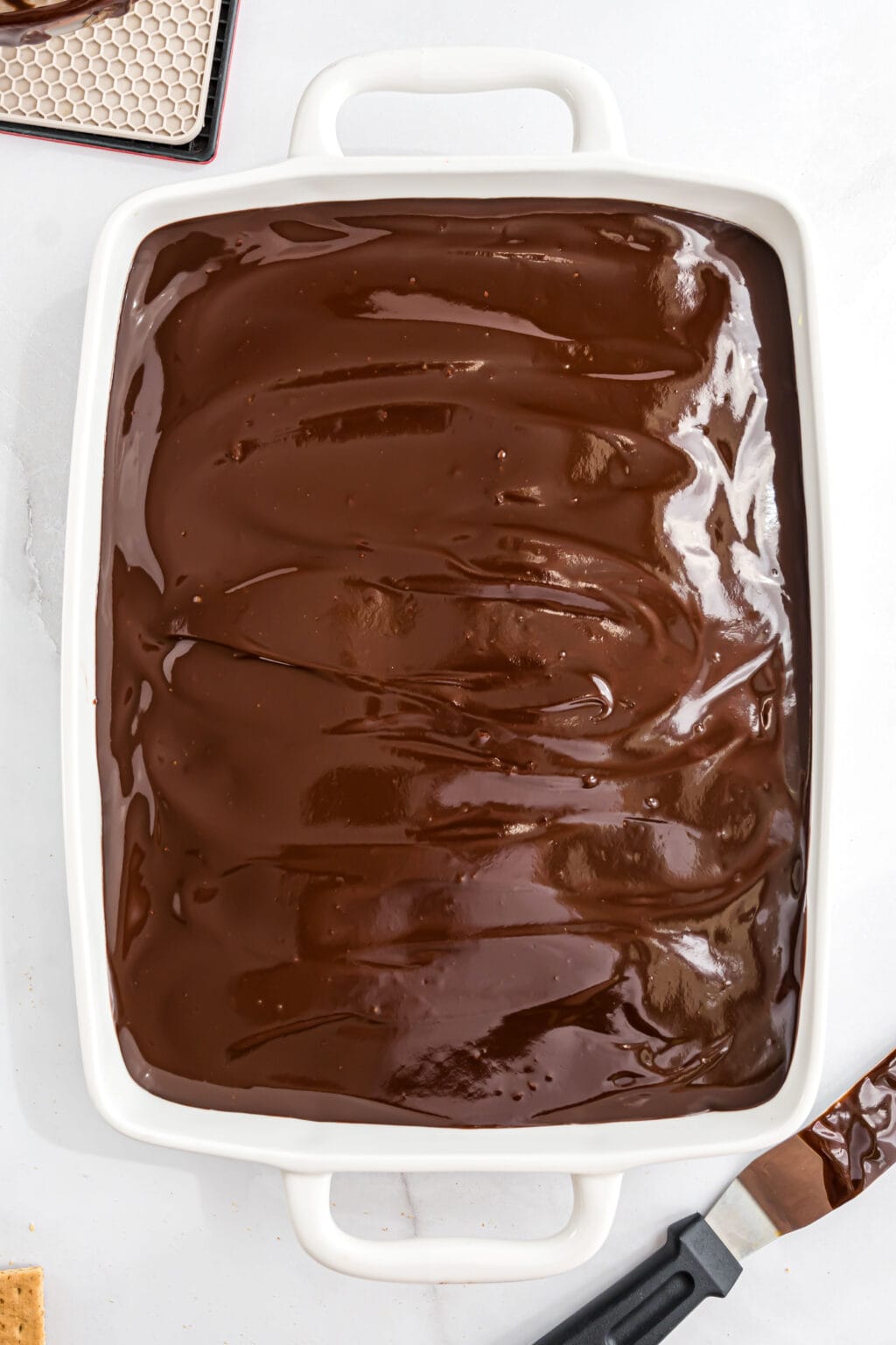 No-Bake Eclair Cake (With Chocolate Ganache Frosting!) - TidyMom®